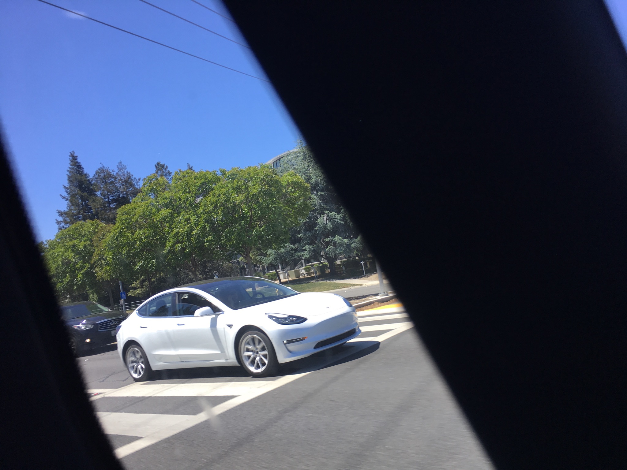 New close encounter spy shots of the White Tesla Model 3