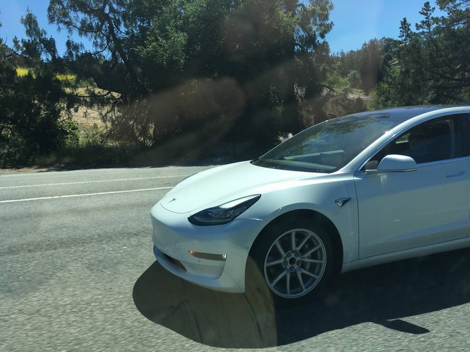 New close encounter spy shots of the White Tesla Model 3